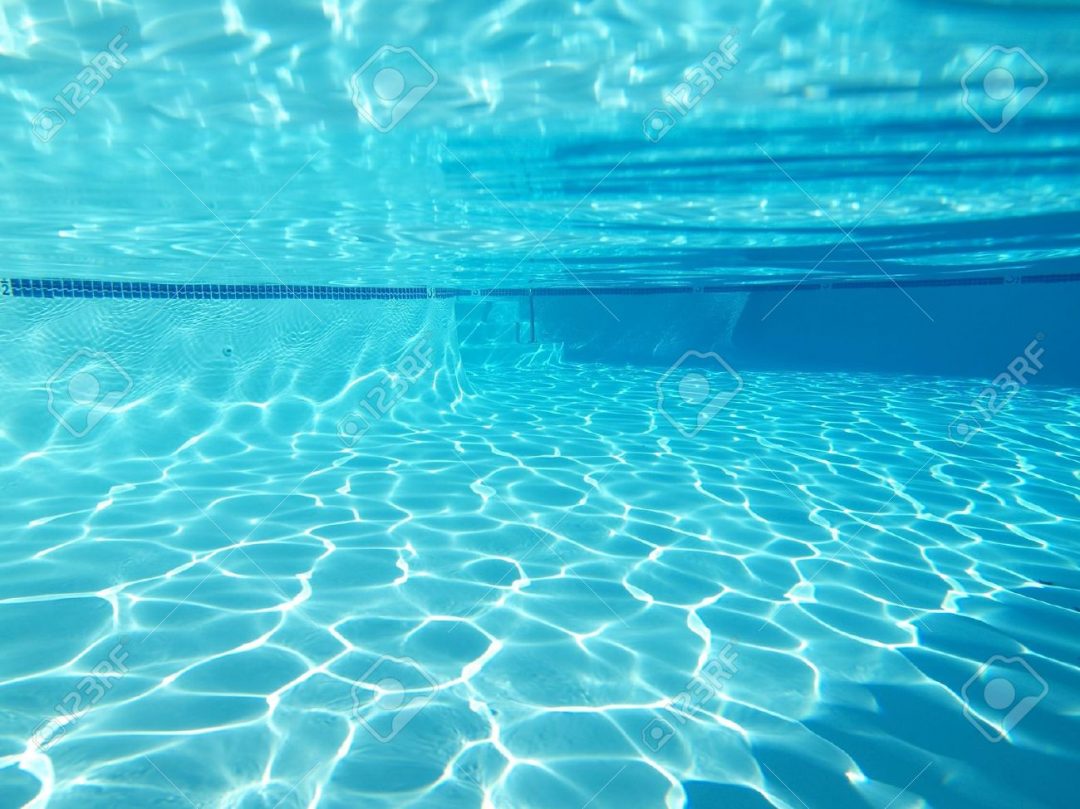 5429857-Underwater-shot-in-a-large-clean-friendly-pool-Stock-Photo ...